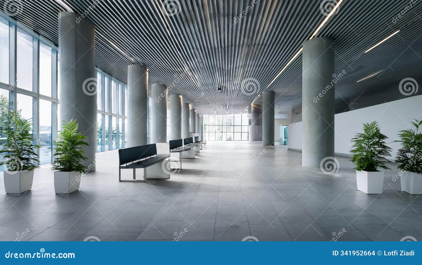 An Empty Modern Office Building Interior with Concrete Pillars, Benches ...
