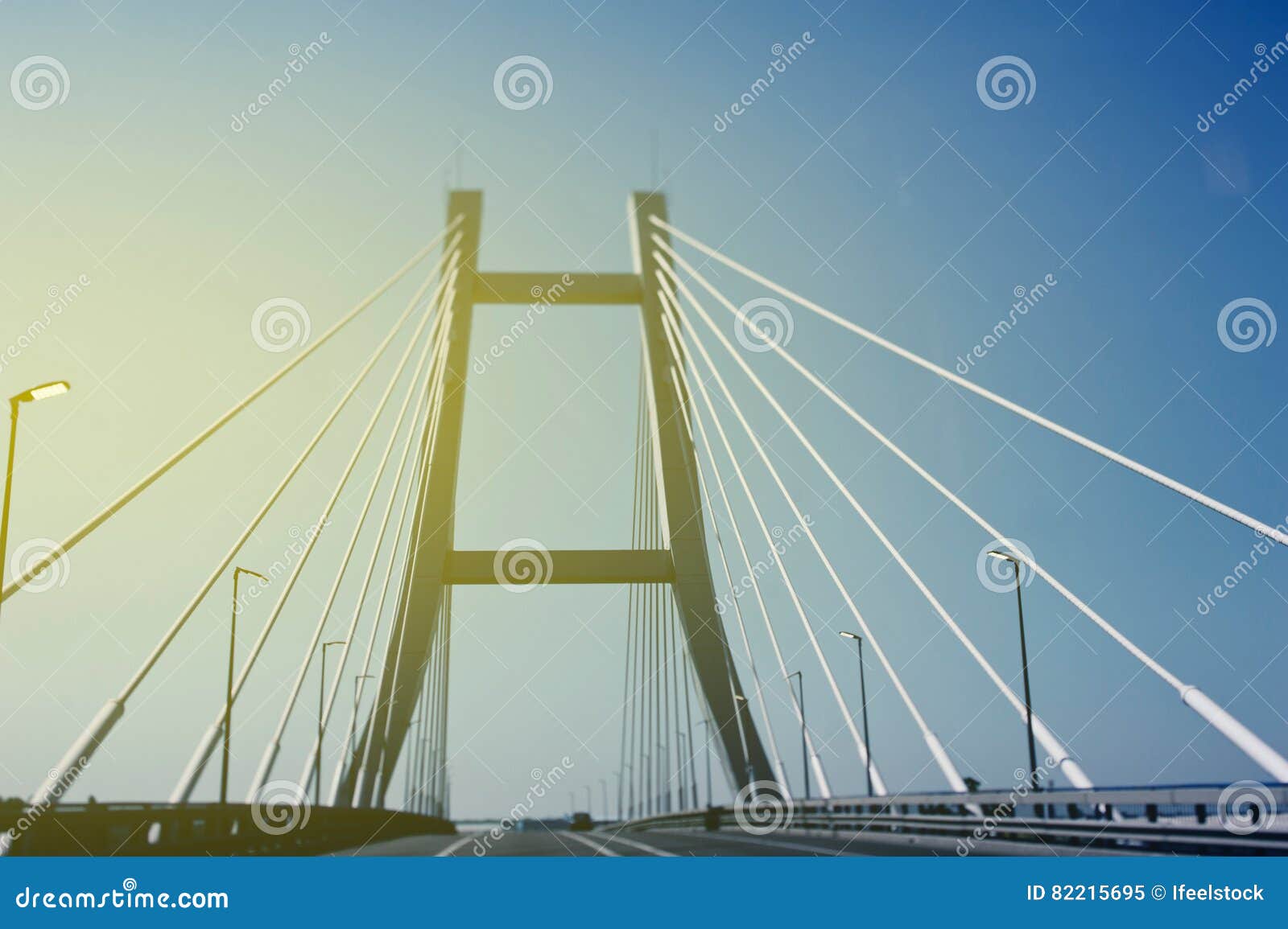 Empty Bridge at Sunrise with Sun Flare Stock Image - Image of bright ...