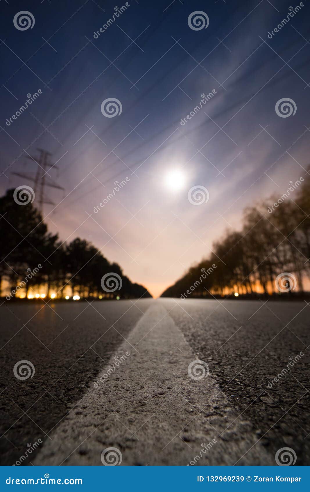 Empty Night Asphalt Road, Bright Full Moon Behind Clouds and City Light ...