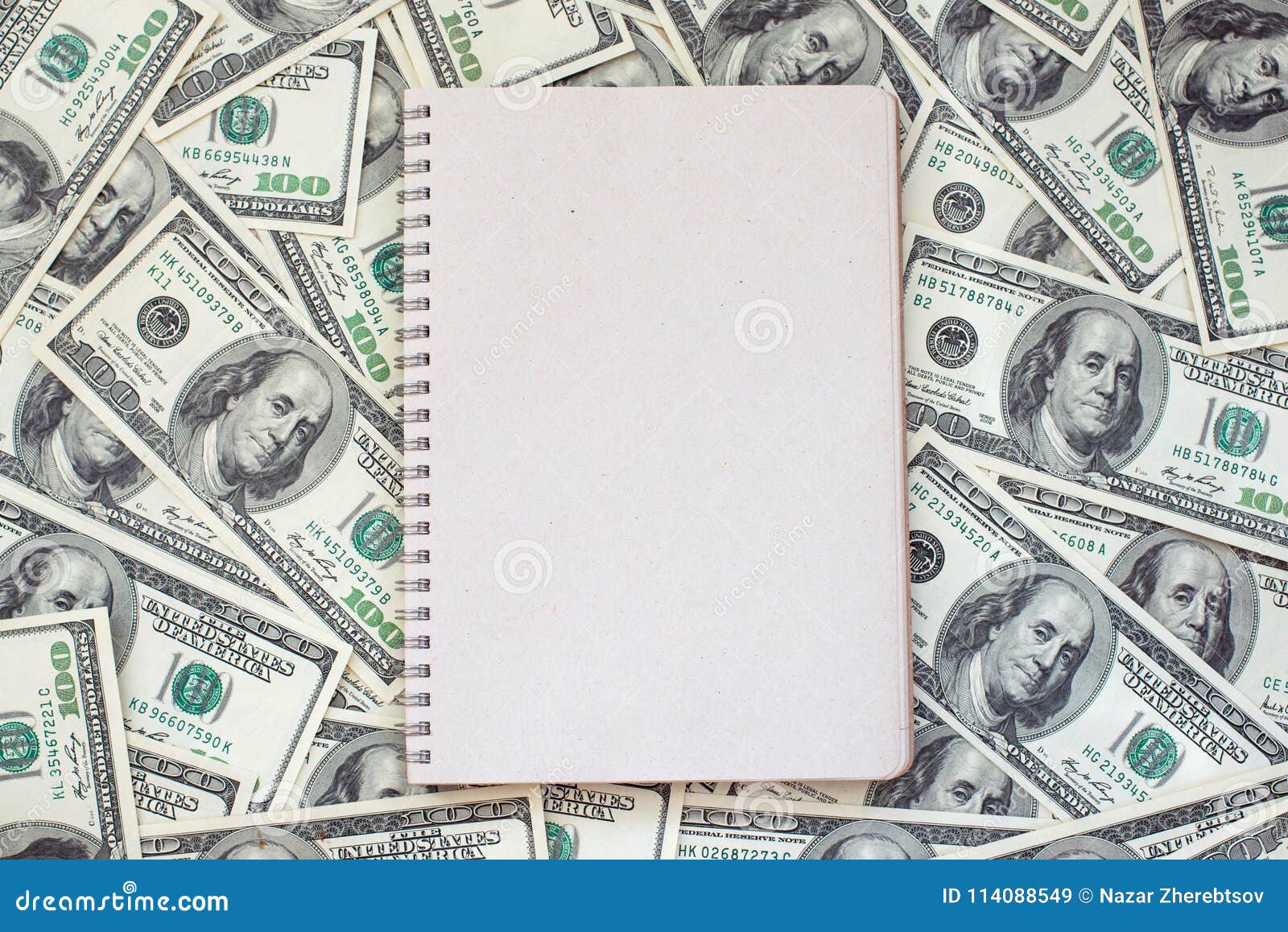 Empty Notebook on Dollar Bills Background. Copy Space. Top View. Stock ...