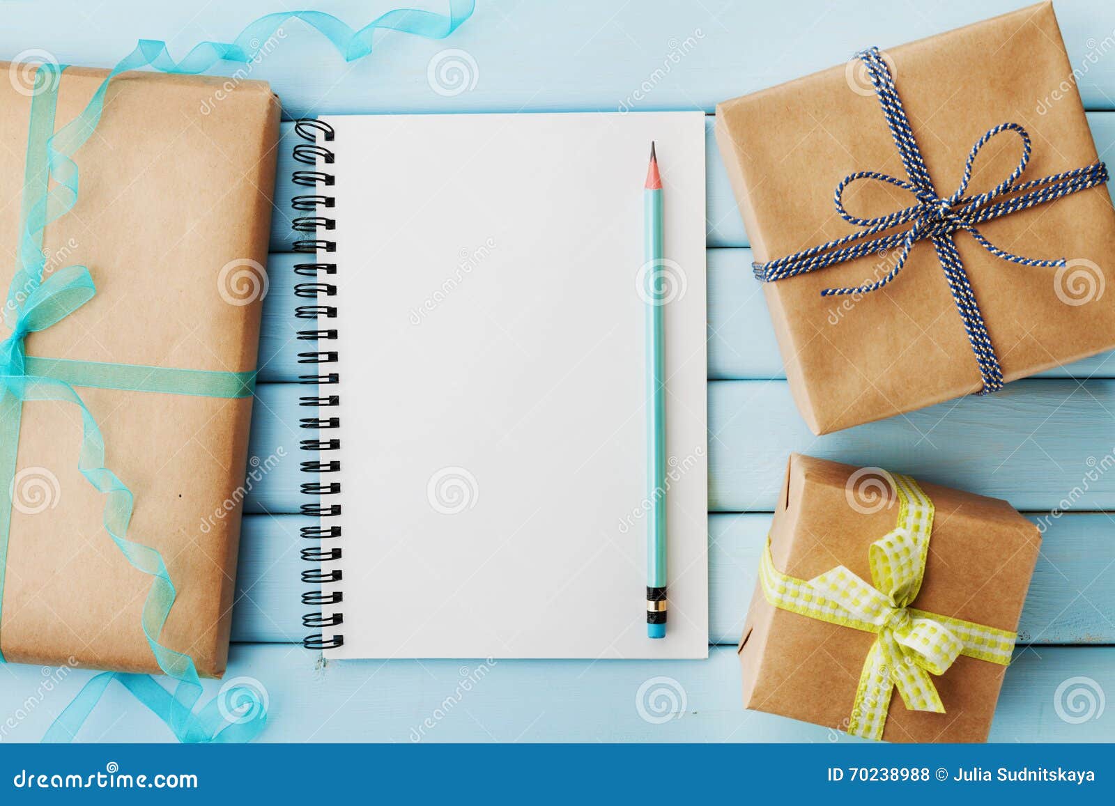 Empty Notebook, Pencil and Gift or Present Box Packed in Kraft Paper on ...