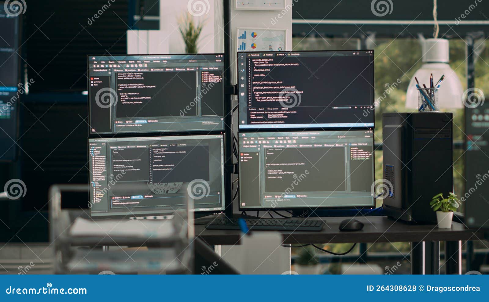 Empty Office Desk with Multiple Screens Running Software Developing ...