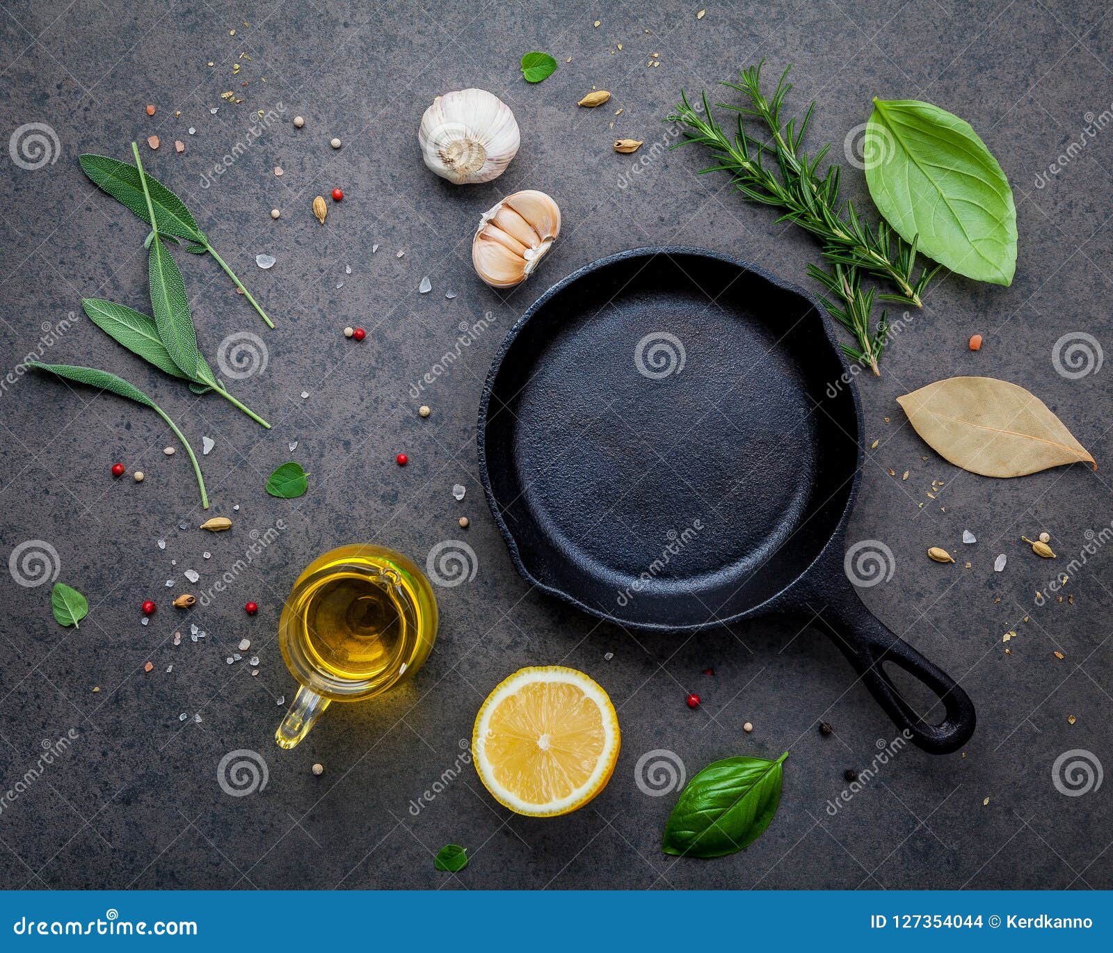 Empty Old Cast Iron Skille on Dark Stone Background. Ingredients Stock ...