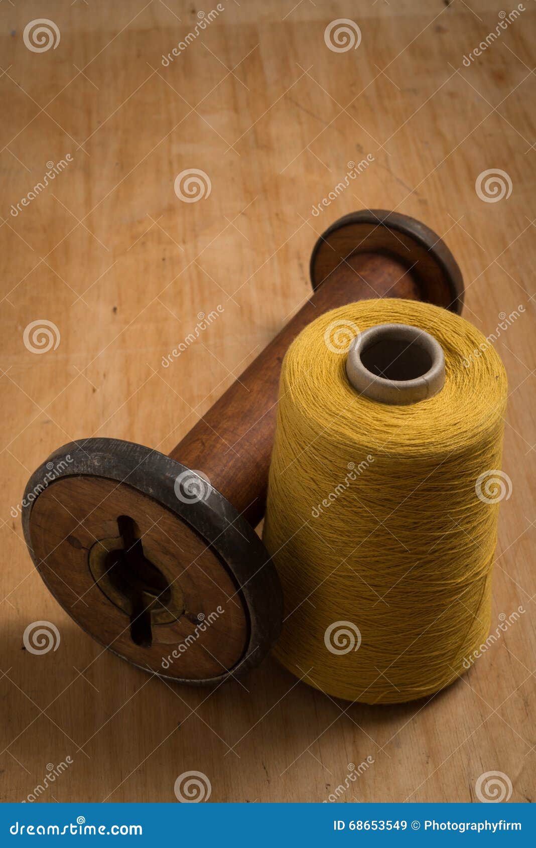 Empty Old Wooden Spool beside Yellow Thread Stock Image - Image of ...