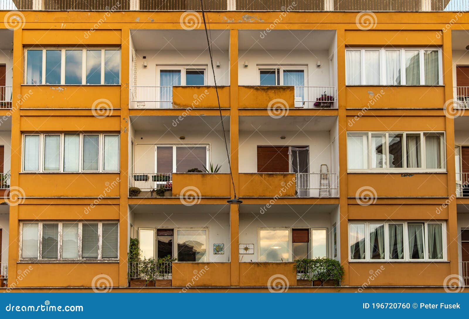 Empty Orange Italian Apartment Building with Balconies Stock Photo ...