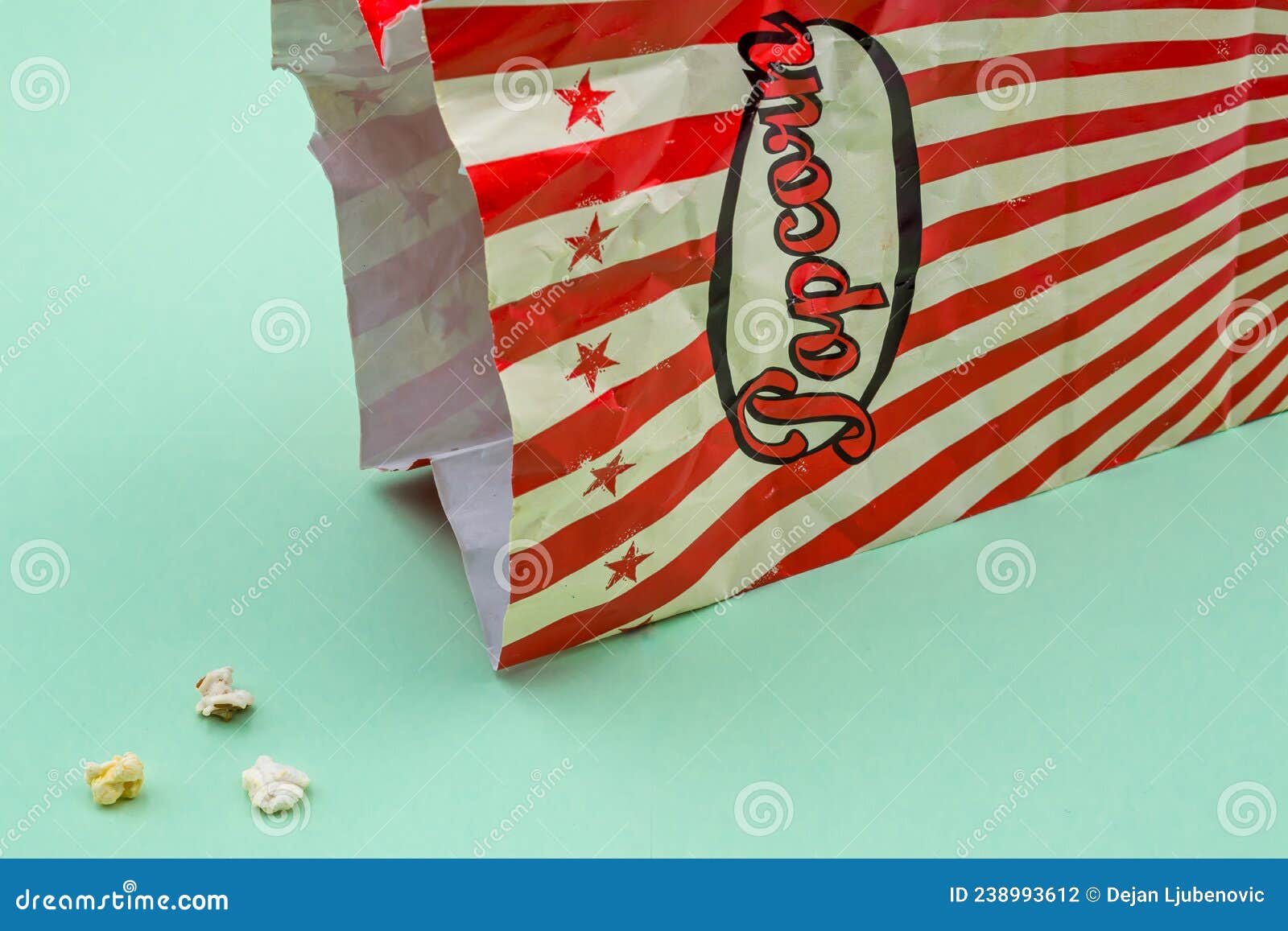 Empty Paper Popcorn Bag on Green Stock Photo - Image of refreshment ...
