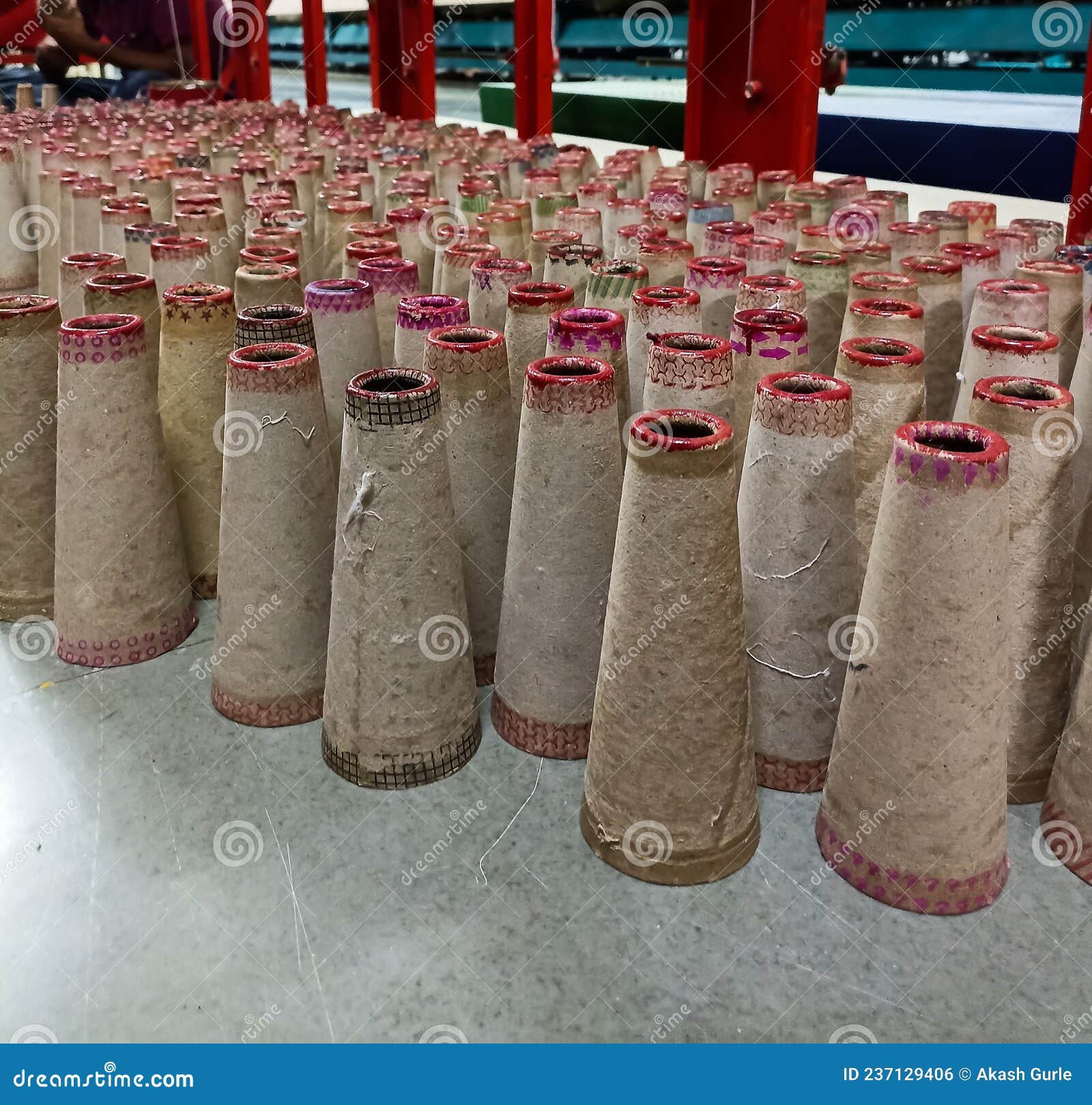 Empty Paper Tube Cone Put on the Floor for Winding in Textile Spinning ...