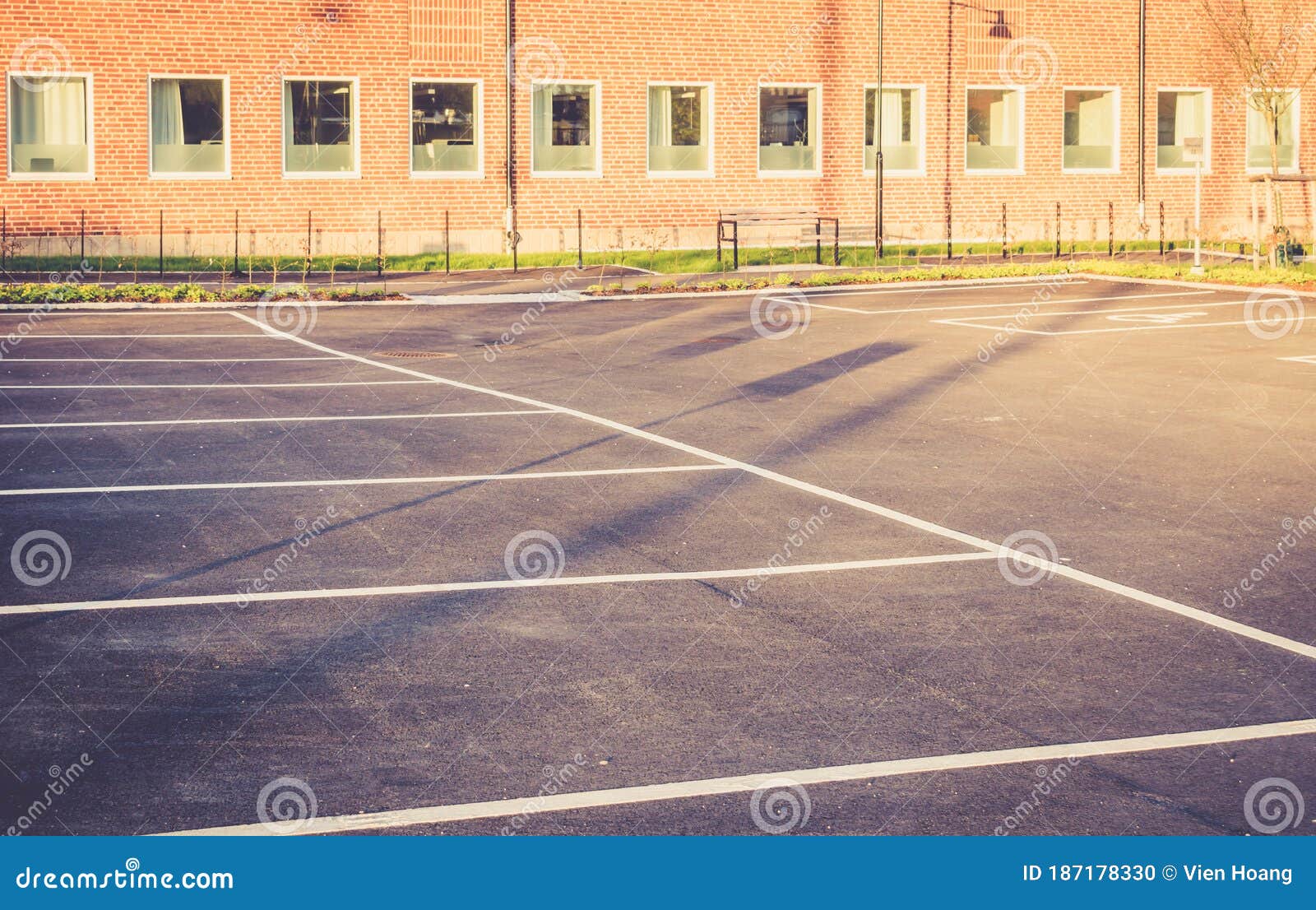 Empty Parking Lot with an Office Building in the Background. Summer ...