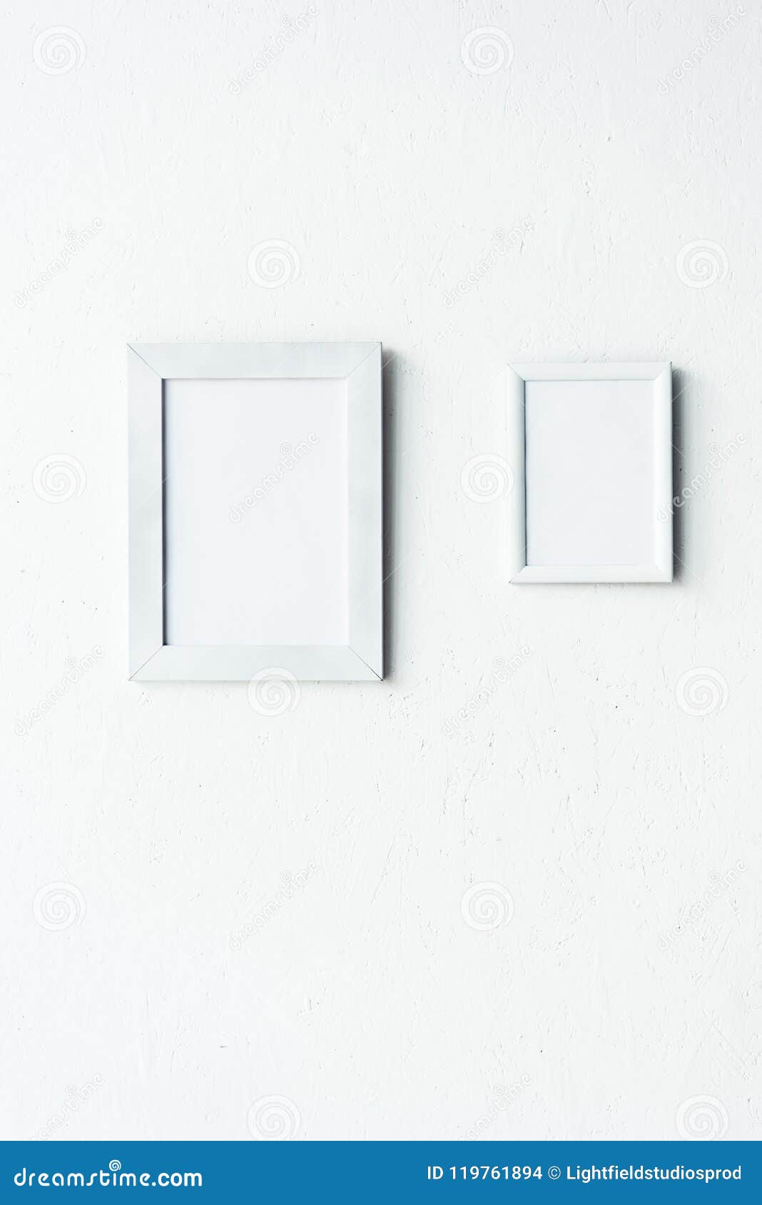 Empty Photo Frames Hanging on Wall Stock Photo - Image of wall ...