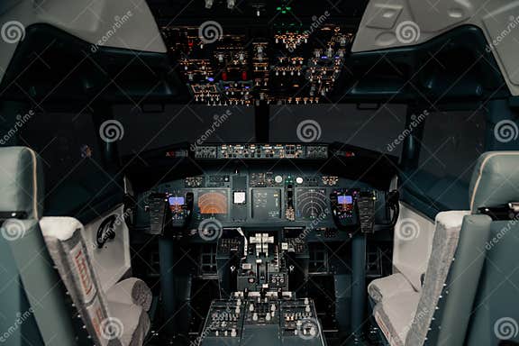 Empty Pilot Cockpit with Switched on Flight Deck Dashboard in Night ...