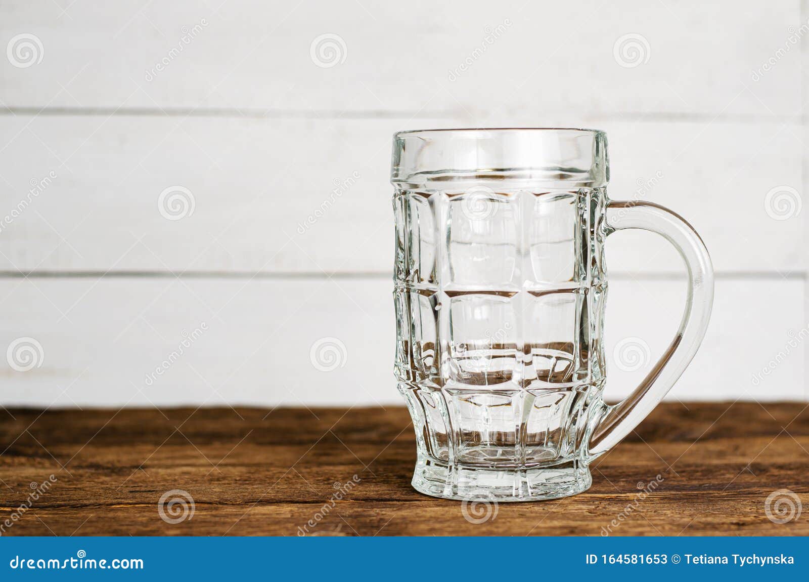 Empty Pint Lager on Wooden Table. Stock Image - Image of pint, closeup ...