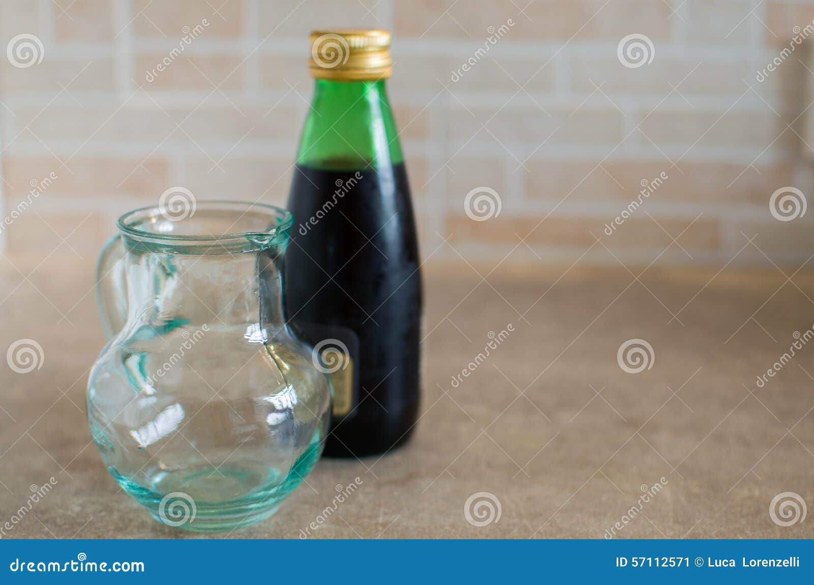Empty Pitcher with Little Wine Bottle Stock Image - Image of pitcher ...