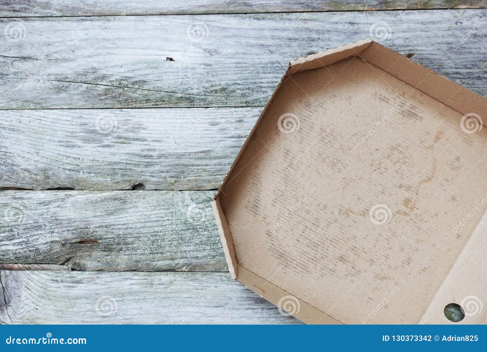 Empty Pizza Box or Cardboard Container for Pizza Delivery on Rustic ...