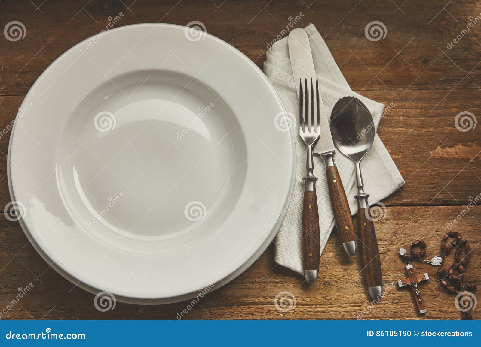 Empty Place Setting with Rosary and Copy Space Stock Photo - Image of ...