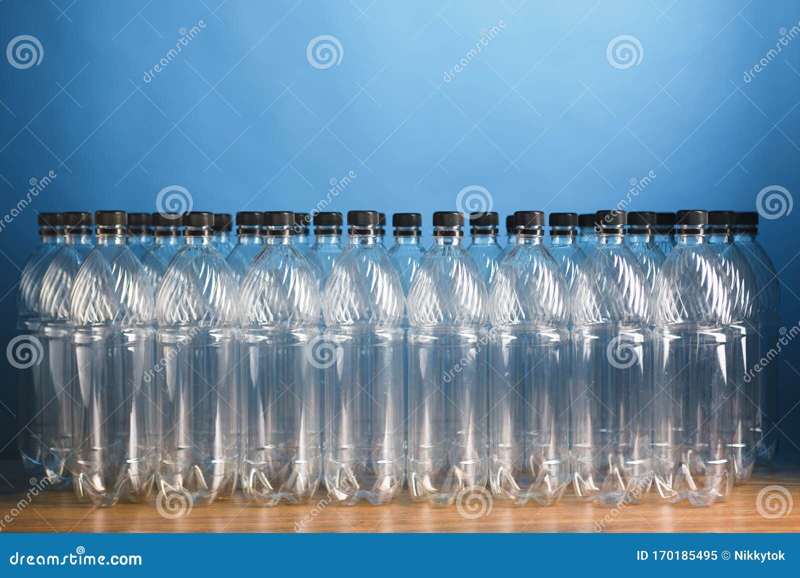 Empty Plastic Bottles on Blue Background Stock Image - Image of ecology ...