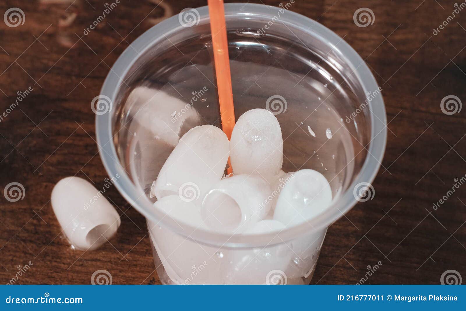 An Empty Plastic Cup is Filled with Ice for Cocktails Stock Image ...