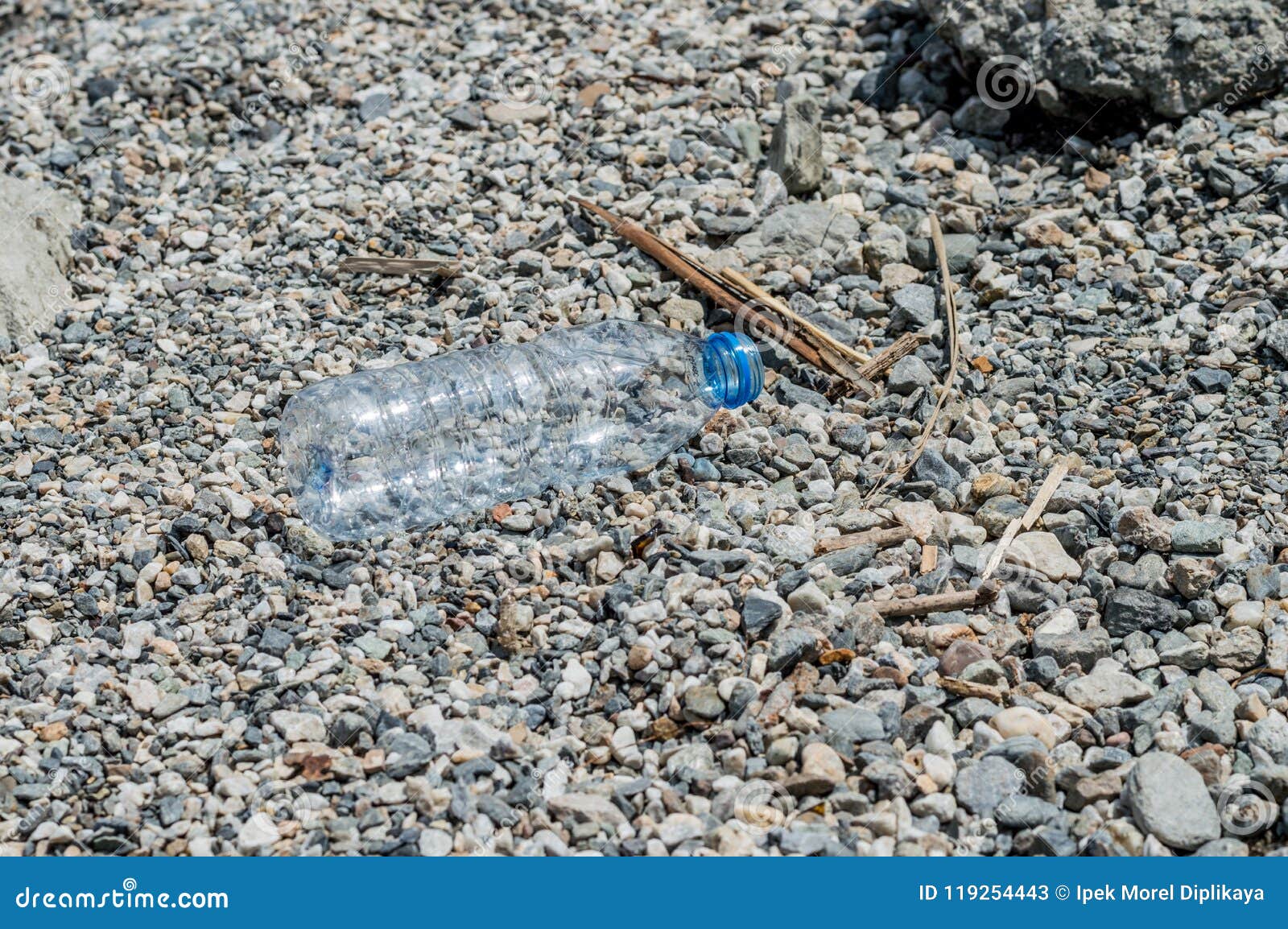 Empty Plastic Garbage Dumped on Pebble Stones Stock Image - Image of ...