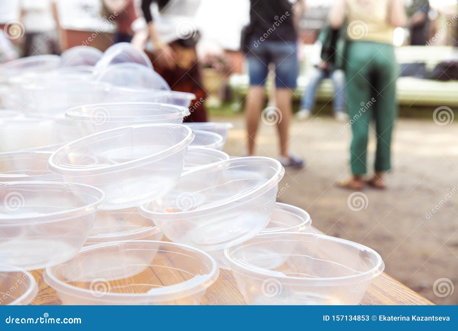 Empty Plastic Plates on the Background of People. the Concept of ...