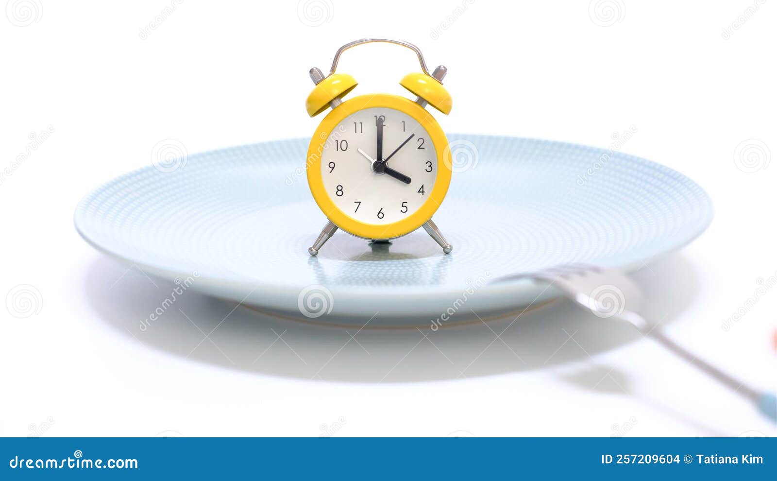 Empty Plate with Alarm Clock and Fork on White Background, Intermittent ...