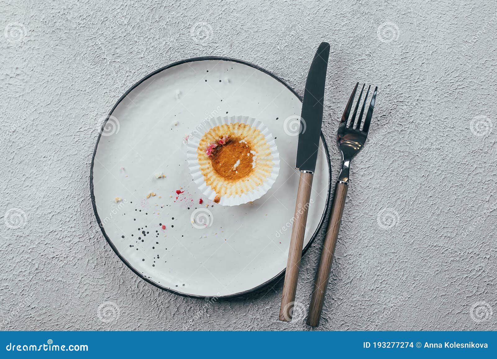 Empty Plate with Crumbs after Eating on Concrete Background. the ...