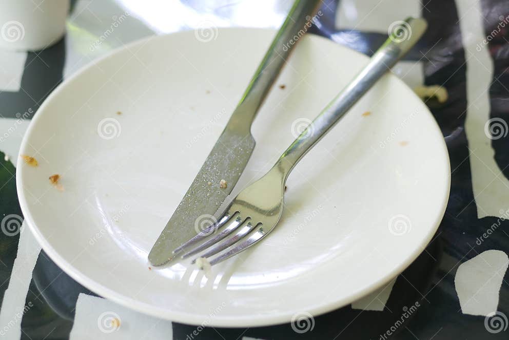 Empty Plate after Eating on Table Stock Photo - Image of surface, messy ...
