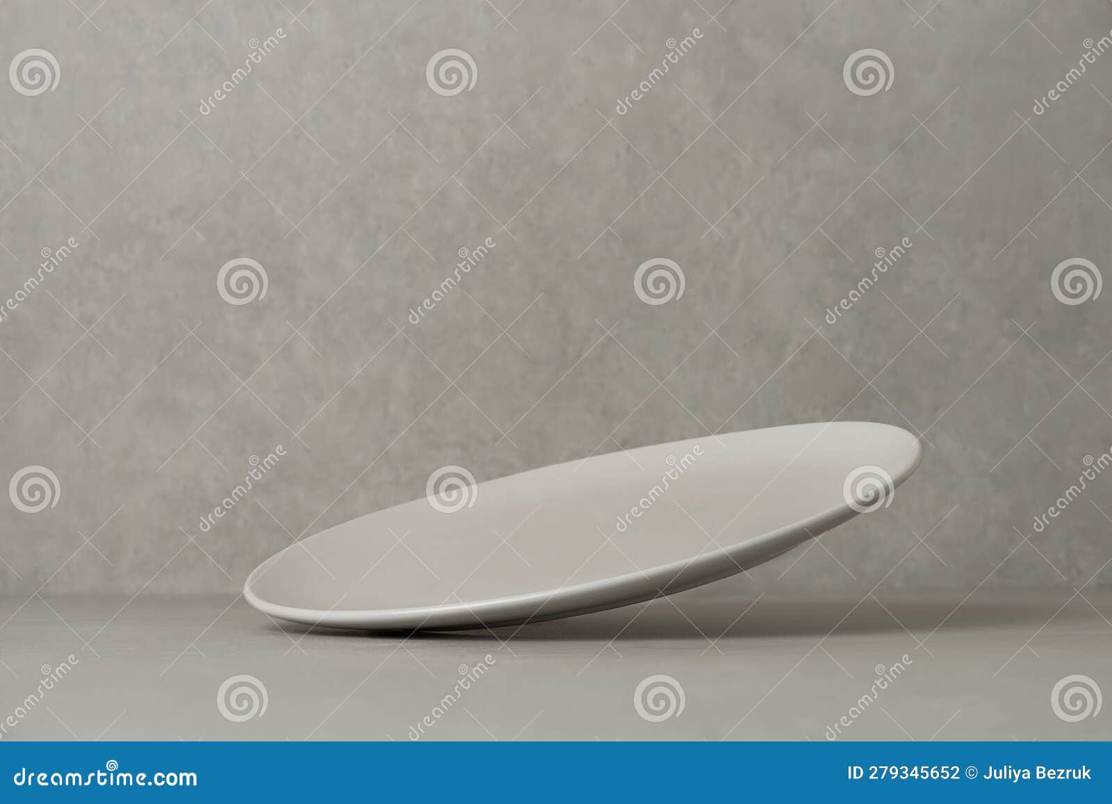 Empty Plate Falling on the Table Stock Photo - Image of blank, object ...