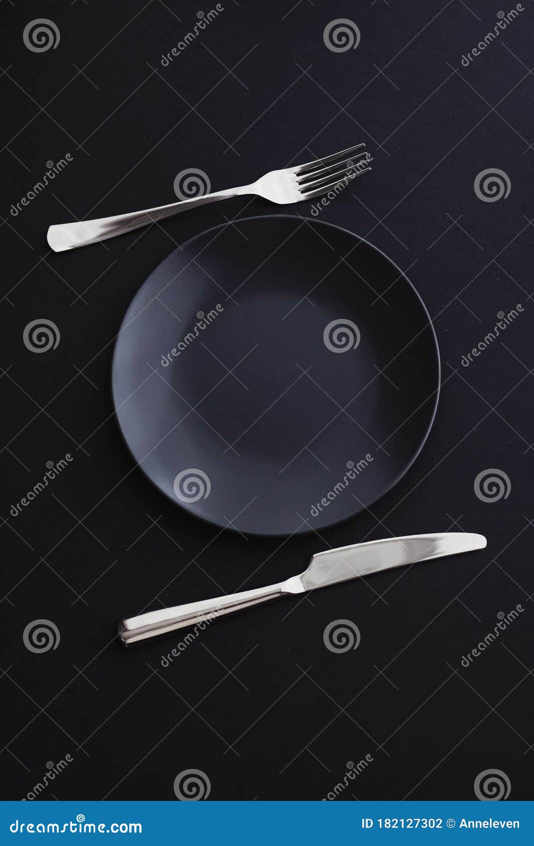 Empty Plates and Silverware on Black Background, Premium Tableware for ...