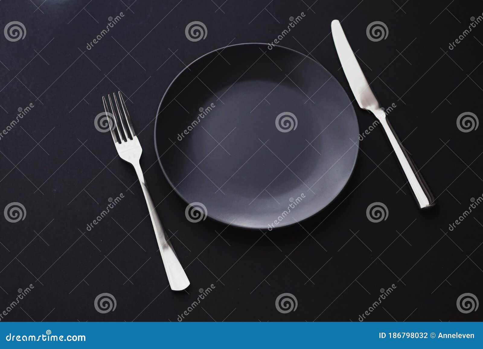 Empty Plates and Silverware on Black Background, Premium Tableware for ...