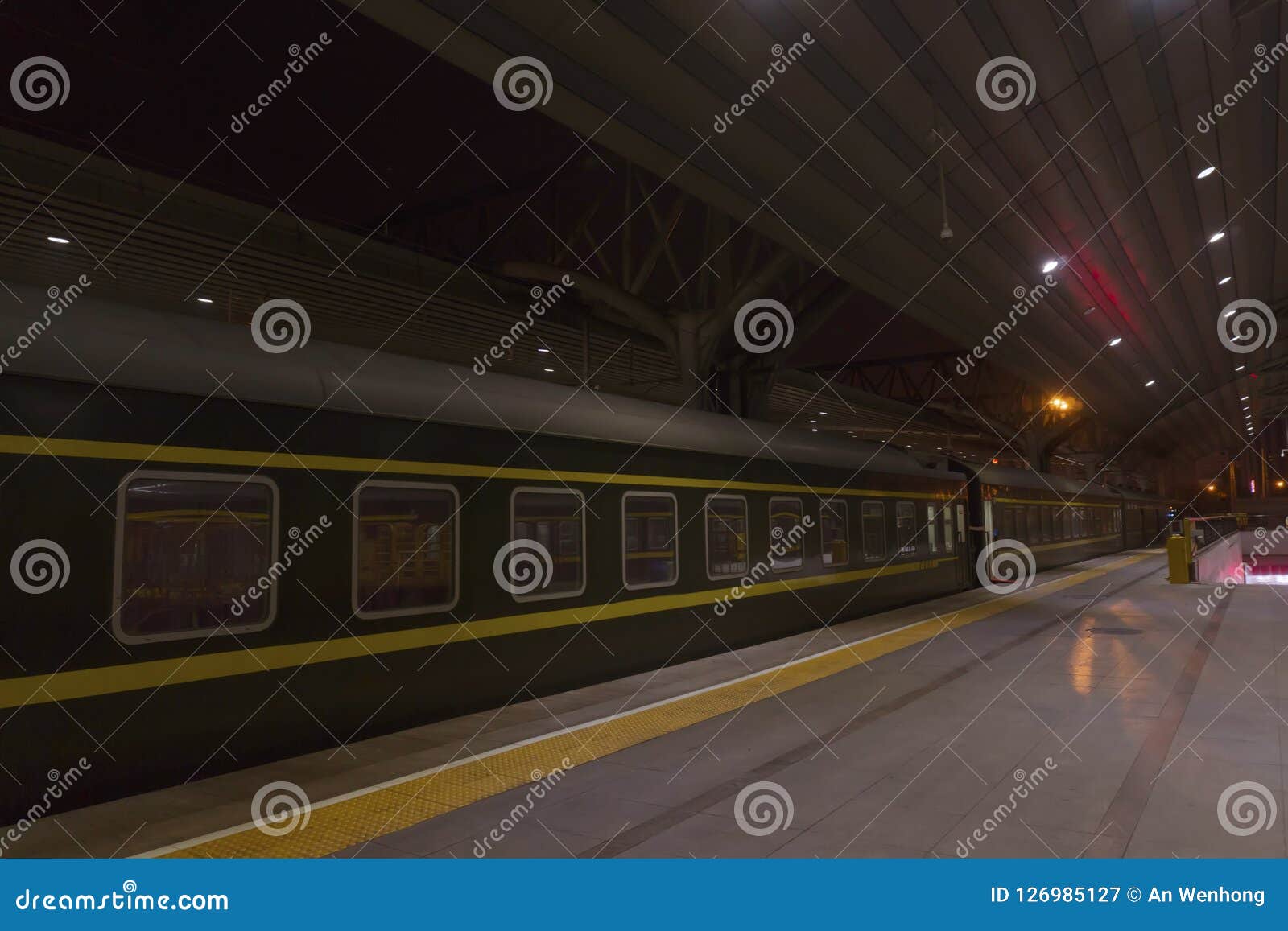The Railway Platform and the Train at Night. Stock Image - Image of ...