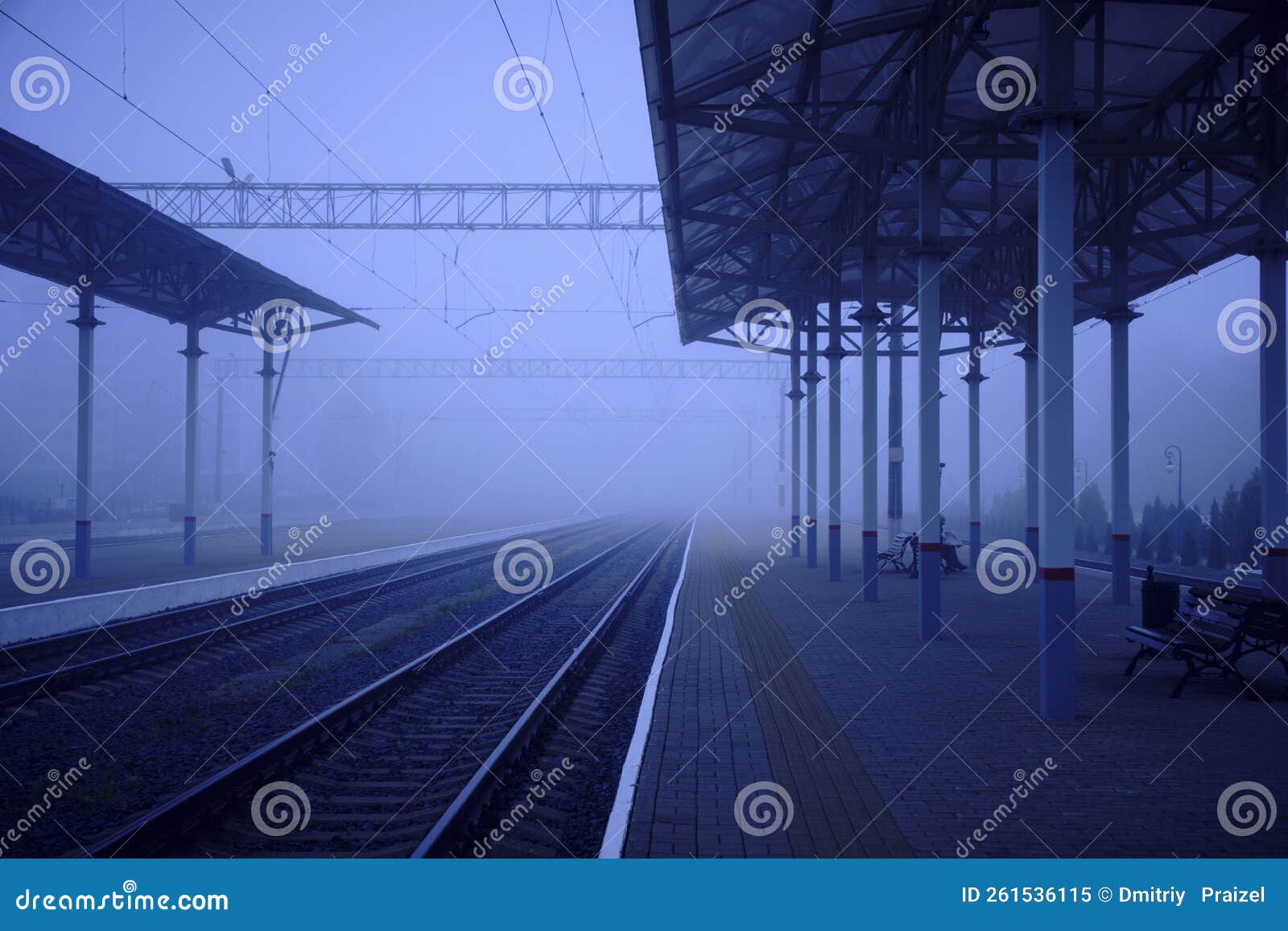 Empty Platform at Station and Rails Going into Fog. Stock Image - Image ...