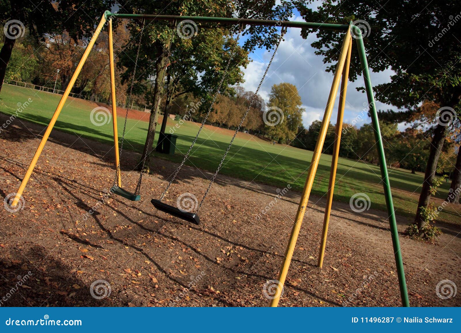 Empty playground in autumn stock image. Image of green - 11496287