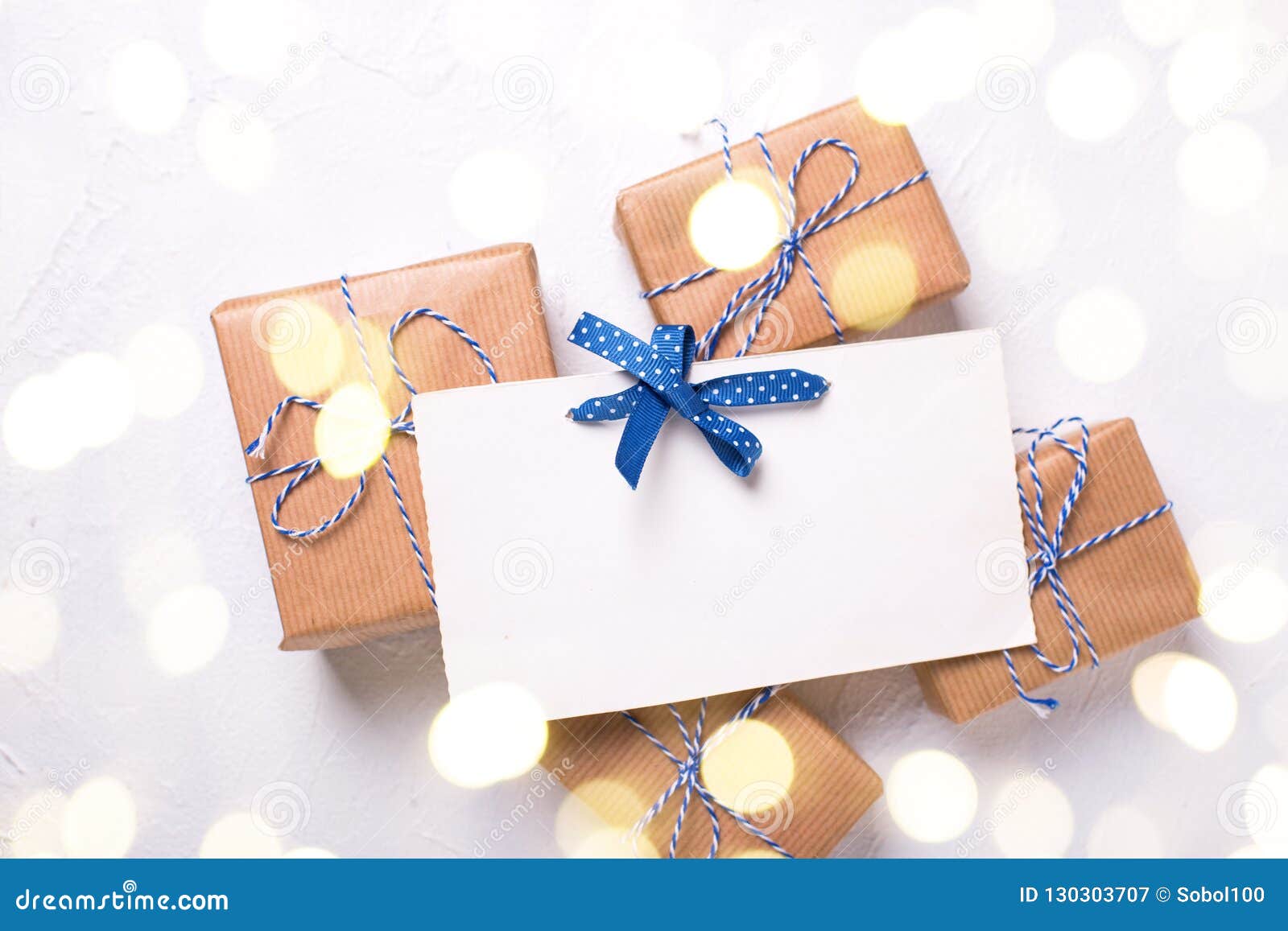 Empty Postcard and Wrapped Gift Boxes with Presents on Textur Stock ...