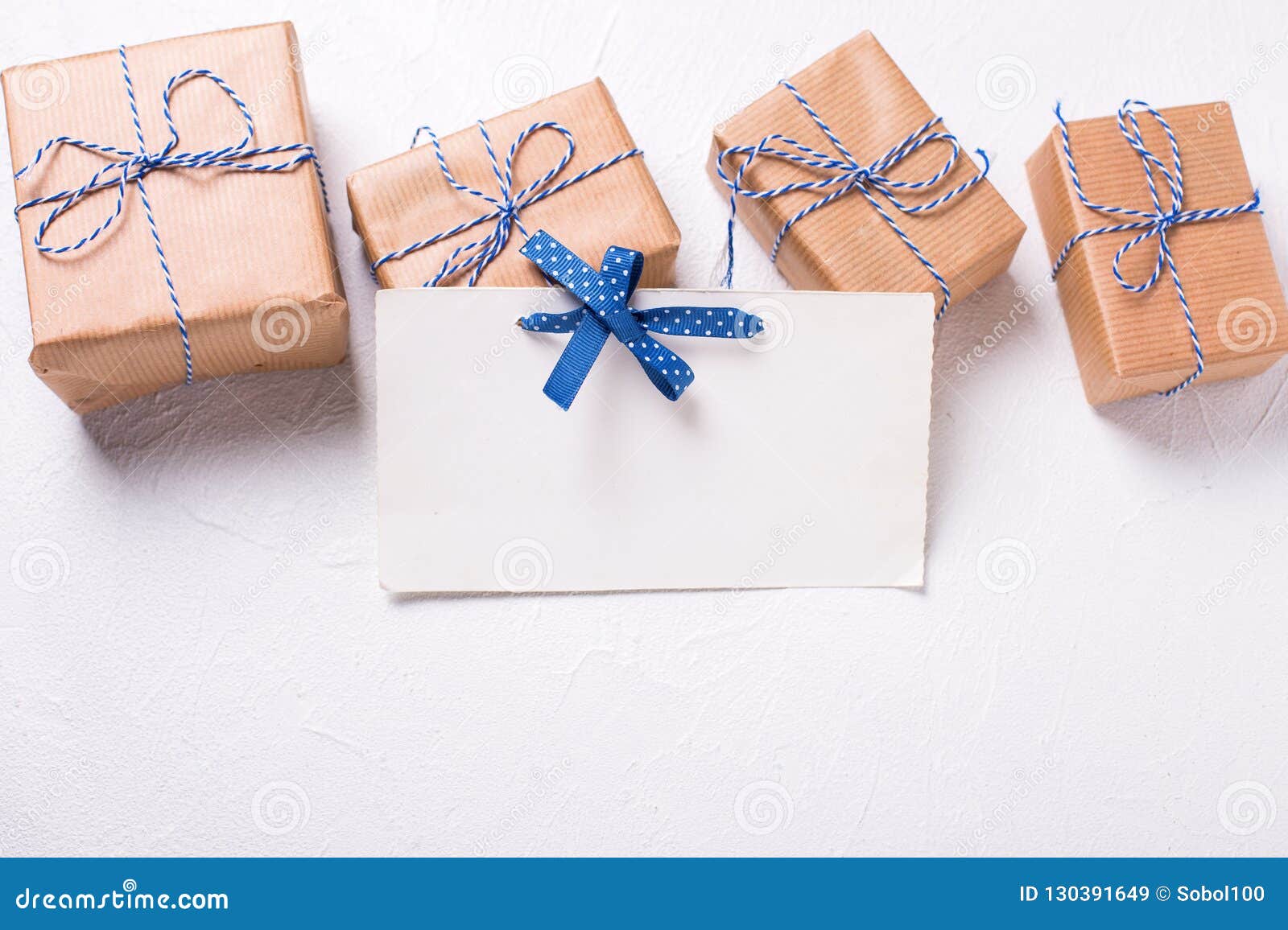 Empty Postcard and Wrapped Gift Boxes with Presents on Textur Stock ...