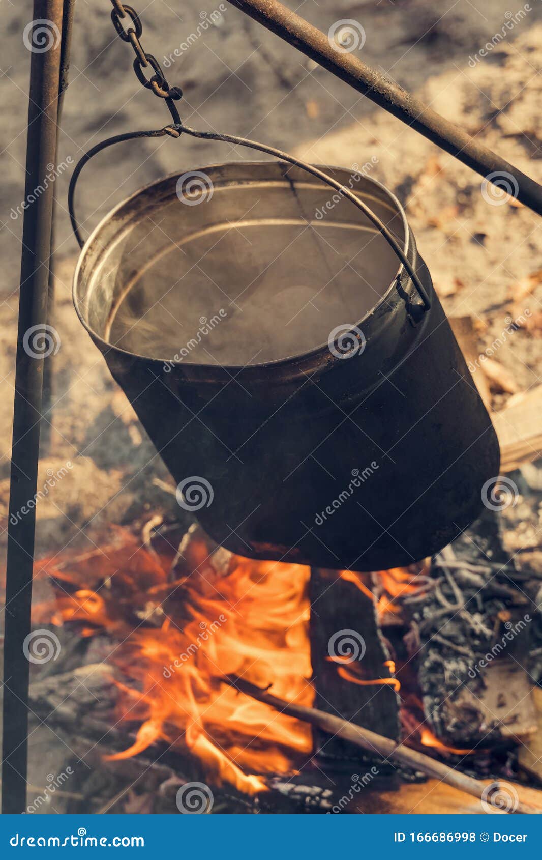 Empty Pot Hanging Over a Burning Fire Stock Photo - Image of close ...