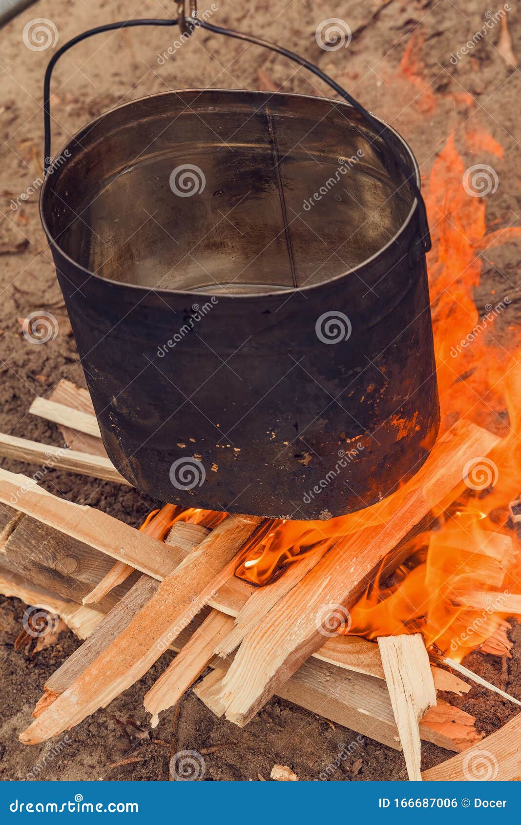 Empty Pot Hanging Over a Burning Fire Stock Photo - Image of metal ...