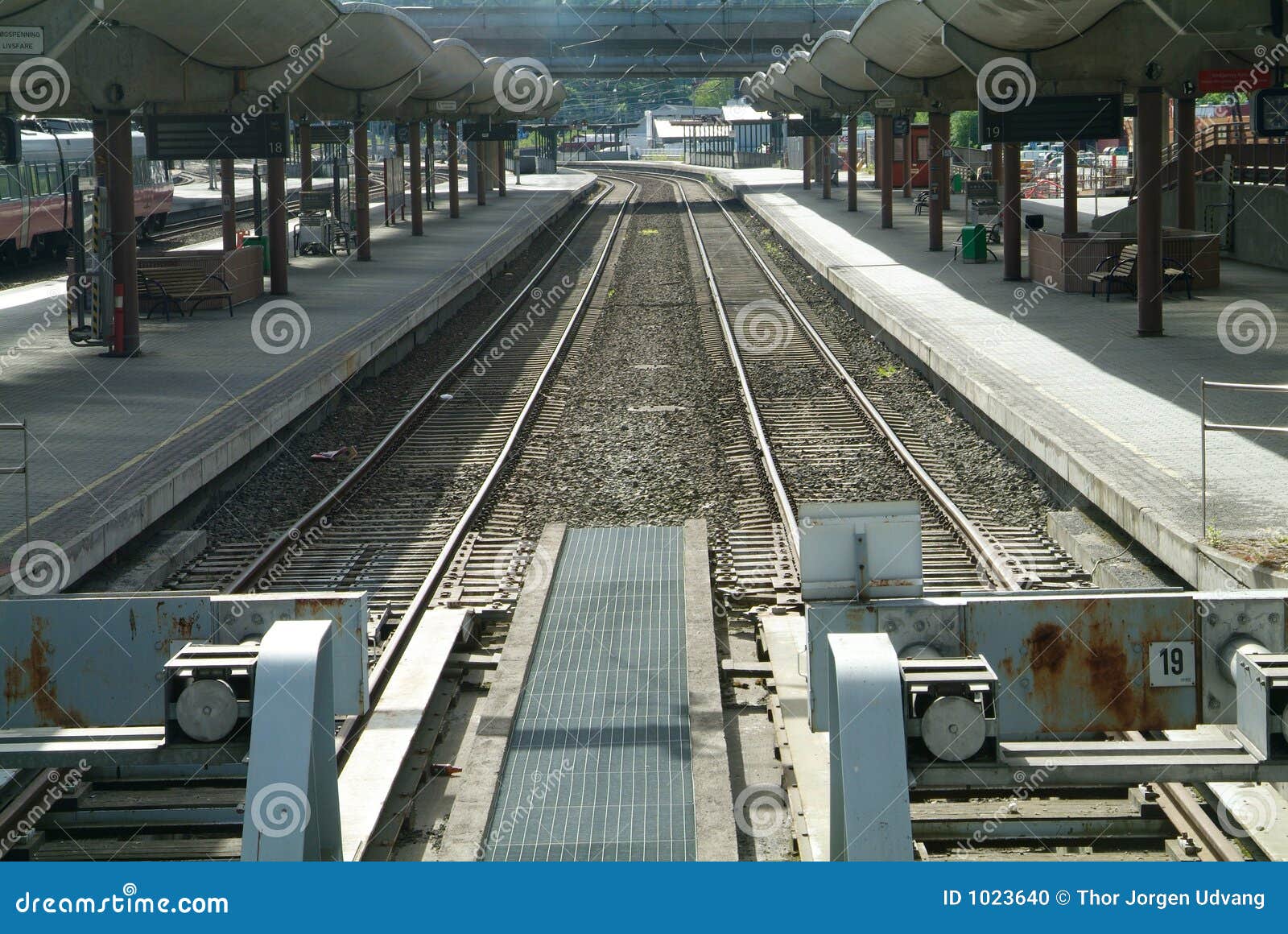 Empty Railway Tracks On The Background Of Modern Trains With Cars ...