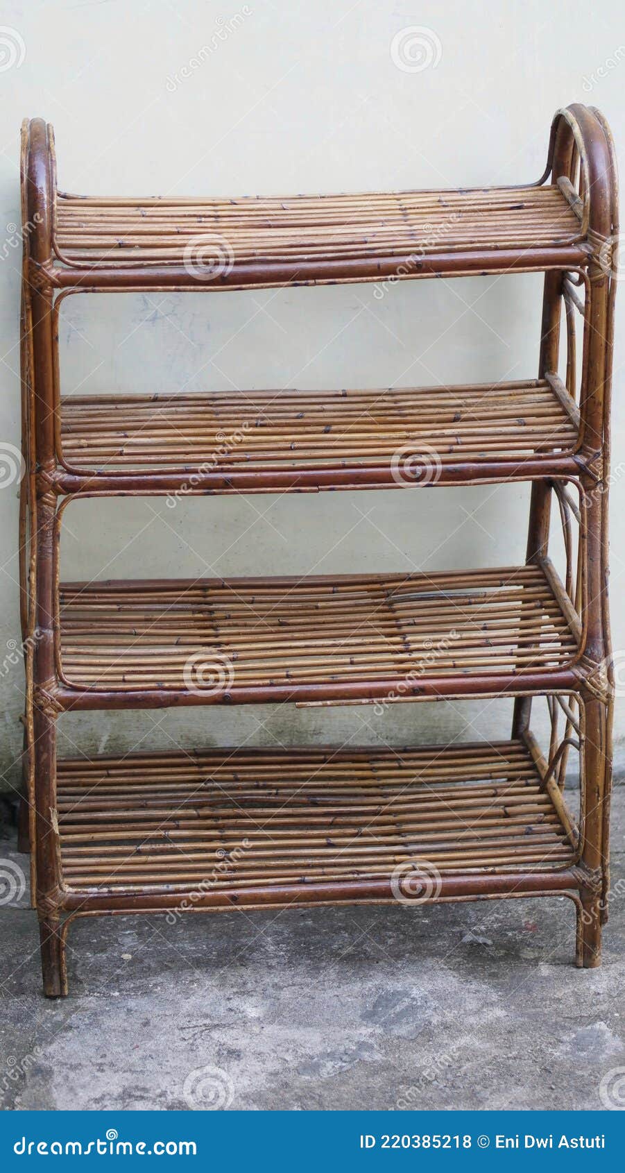 Empty Rattan Shoe Rack on Beige Wall Background Stock Photo - Image of ...