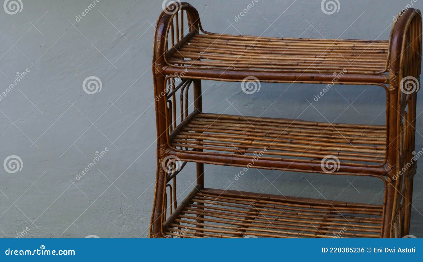 Empty Rattan Shoe Rack on Grey Wall Background Stock Photo - Image of ...