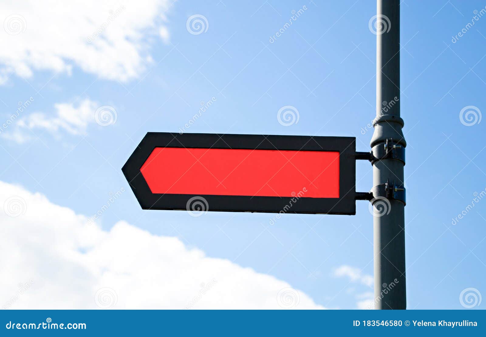 Empty Red Pointer on Metal Pole Indicating To the Left Against the Sky ...