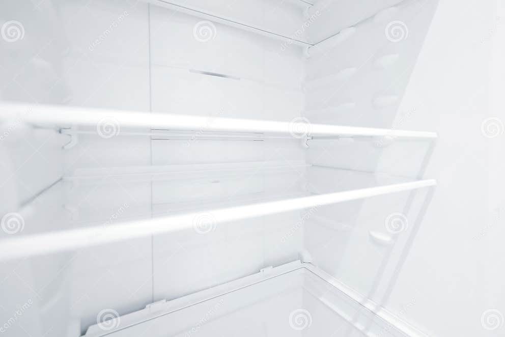 An Empty Refrigerator. Inside an Empty, Clean Refrigerator, a ...
