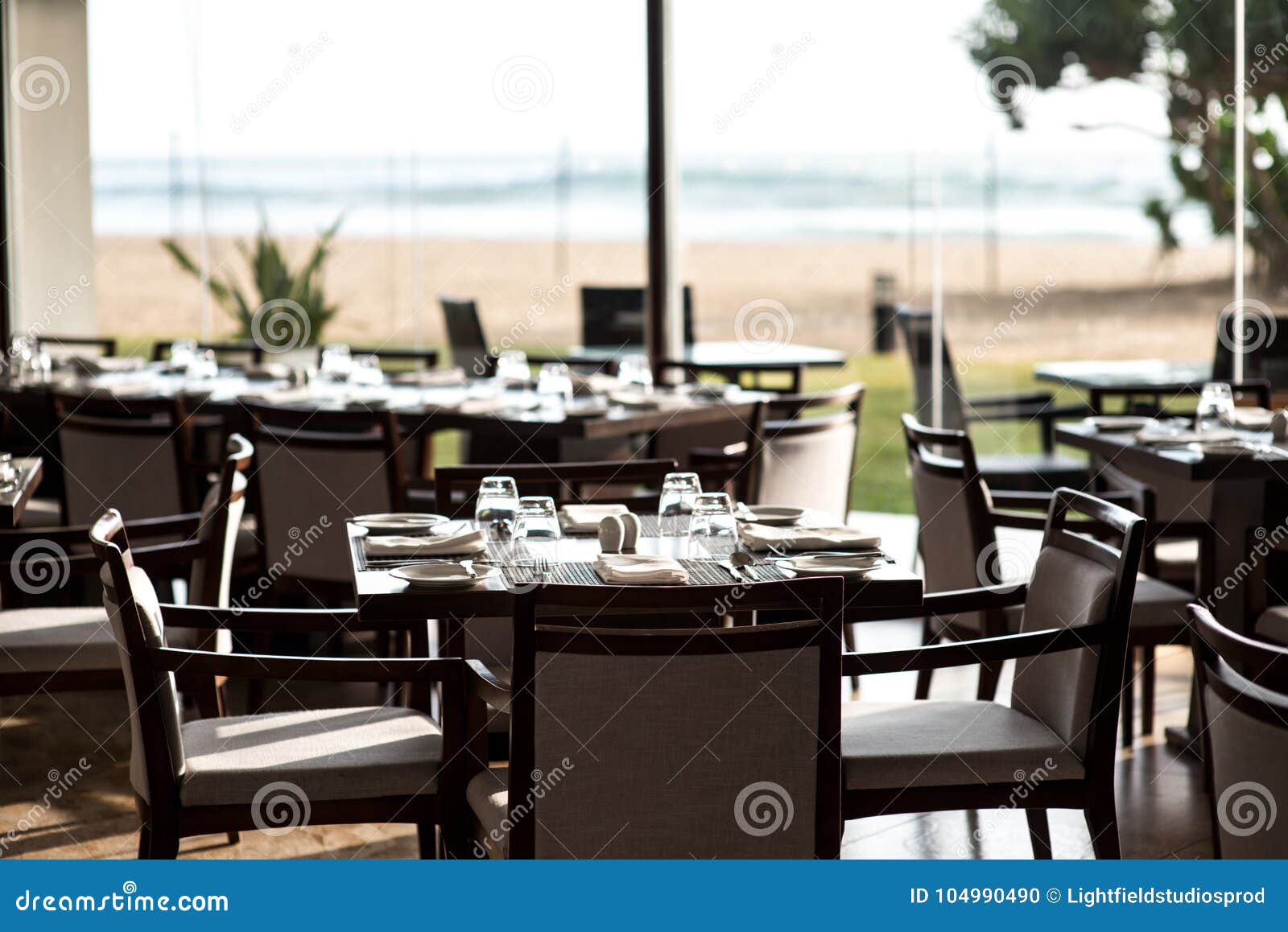Empty Restaurant with Served Tables Stock Photo - Image of chairs ...