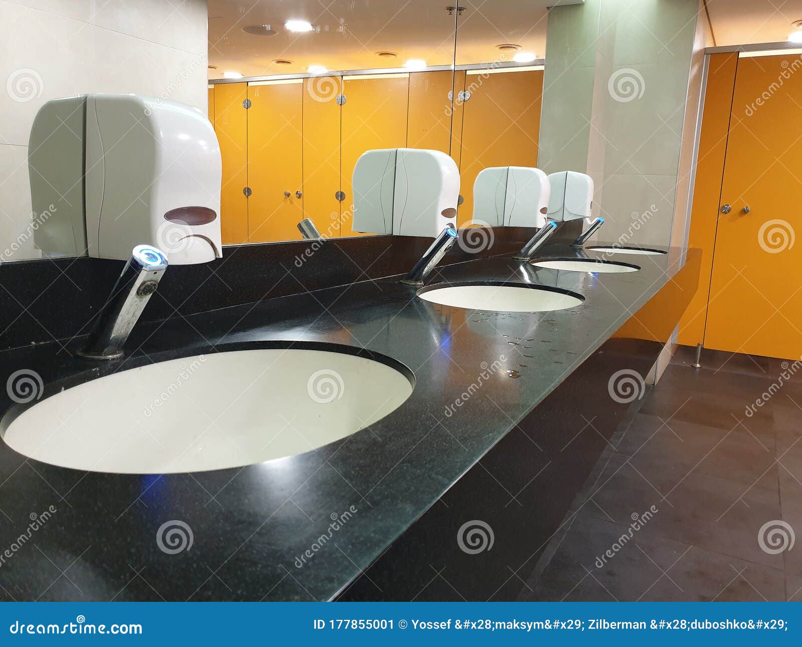 Empty Restroom with Washstands Mirror Sinks in a Public Toilet Stock ...