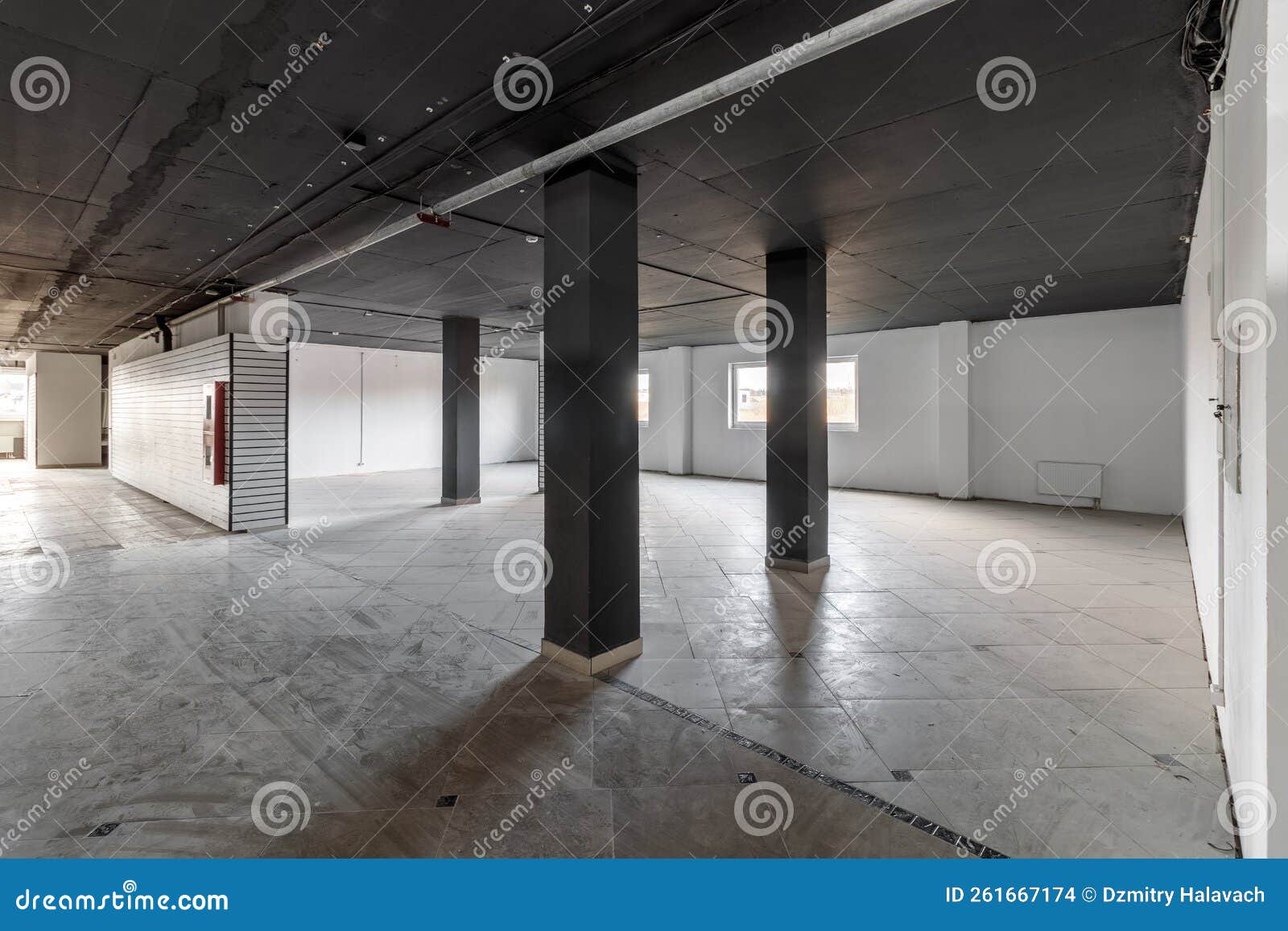 Empty Retail Space with a Black Ceiling and a Dirty Floor, Immediately ...