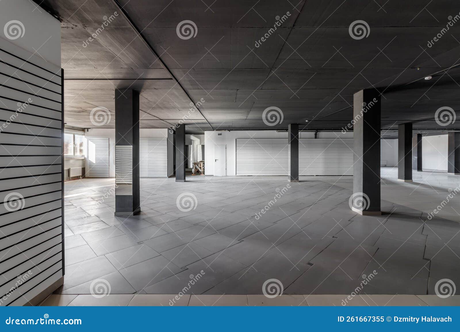 Empty Retail Space with a Black Ceiling and a Dirty Floor, Immediately ...