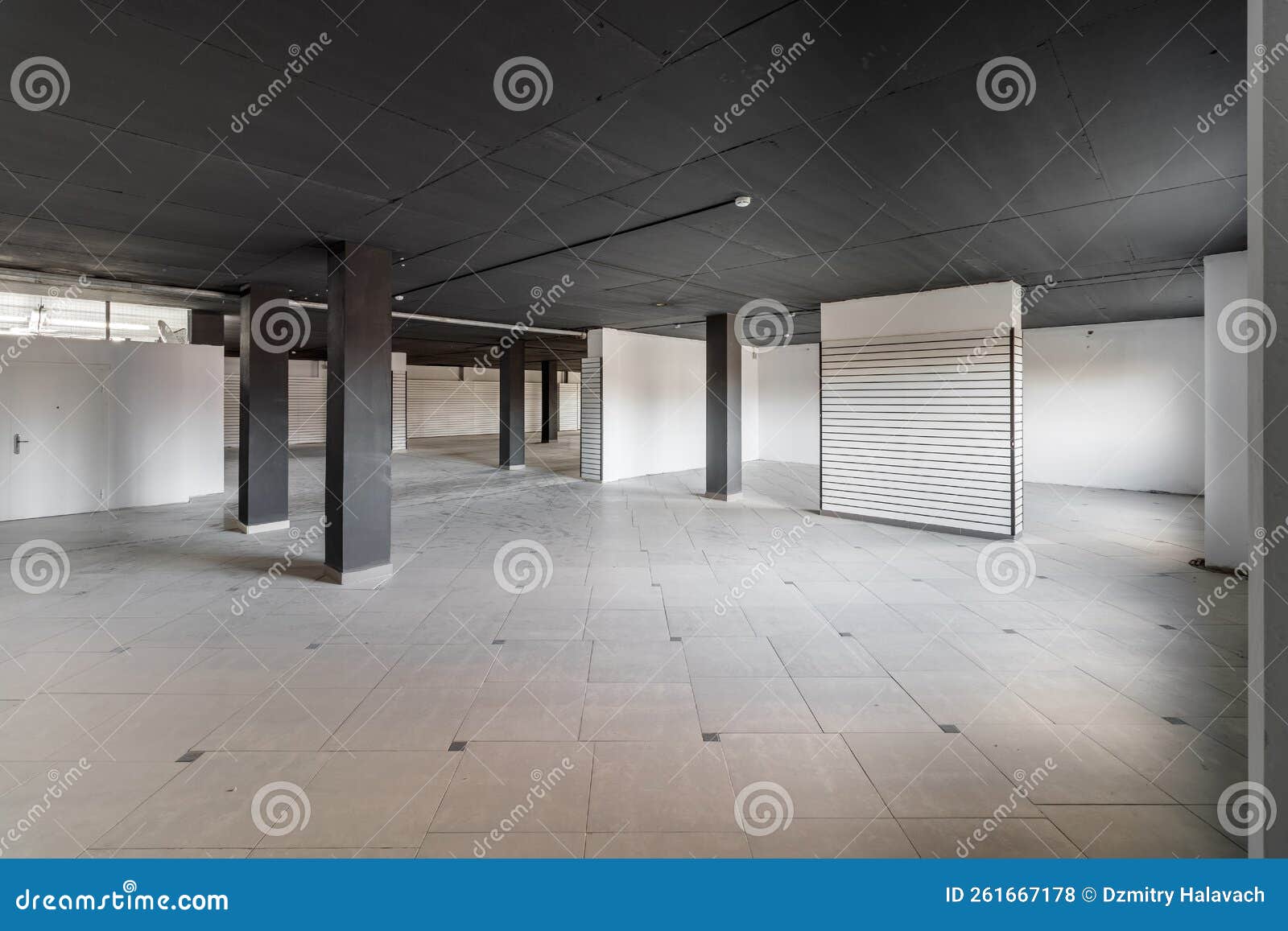 Empty Retail Space with a Black Ceiling and a Dirty Floor, Immediately ... Empty Retail Space with a Black Ceiling and a Dirty Floor, Immediately ...