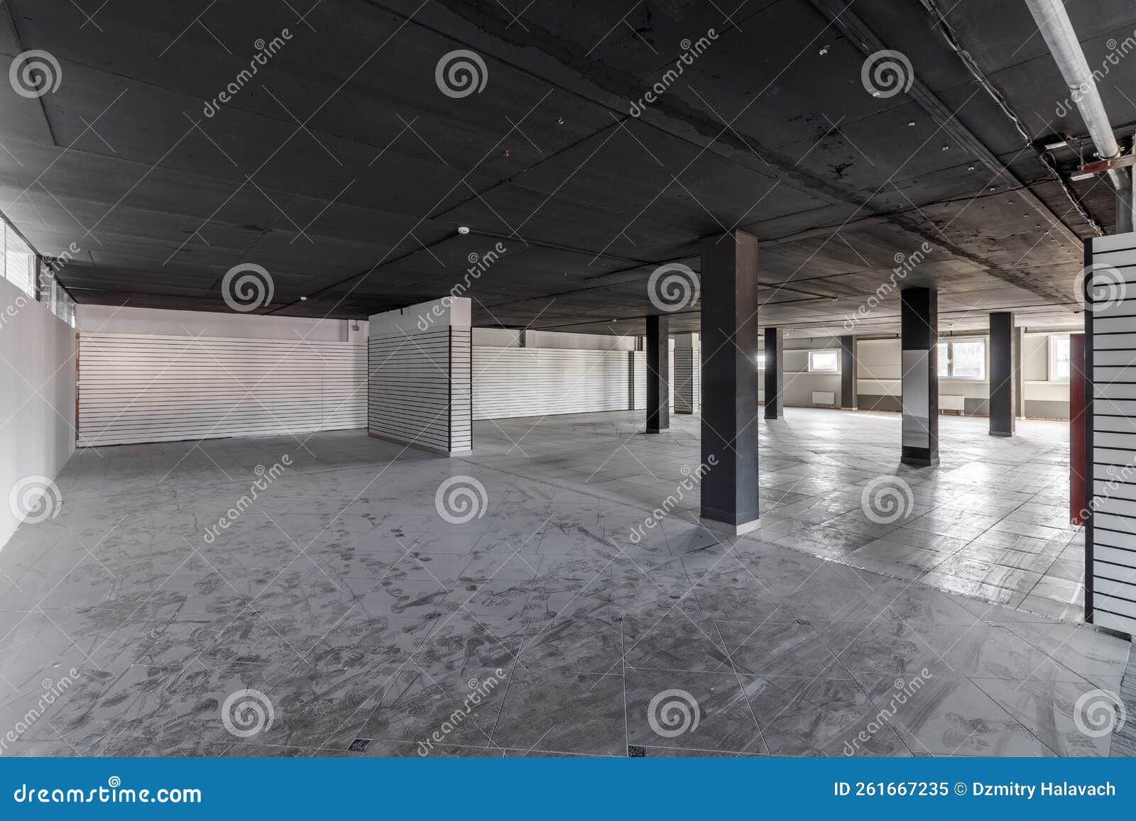 Empty Retail Space with a Black Ceiling and a Dirty Floor, Immediately ...
