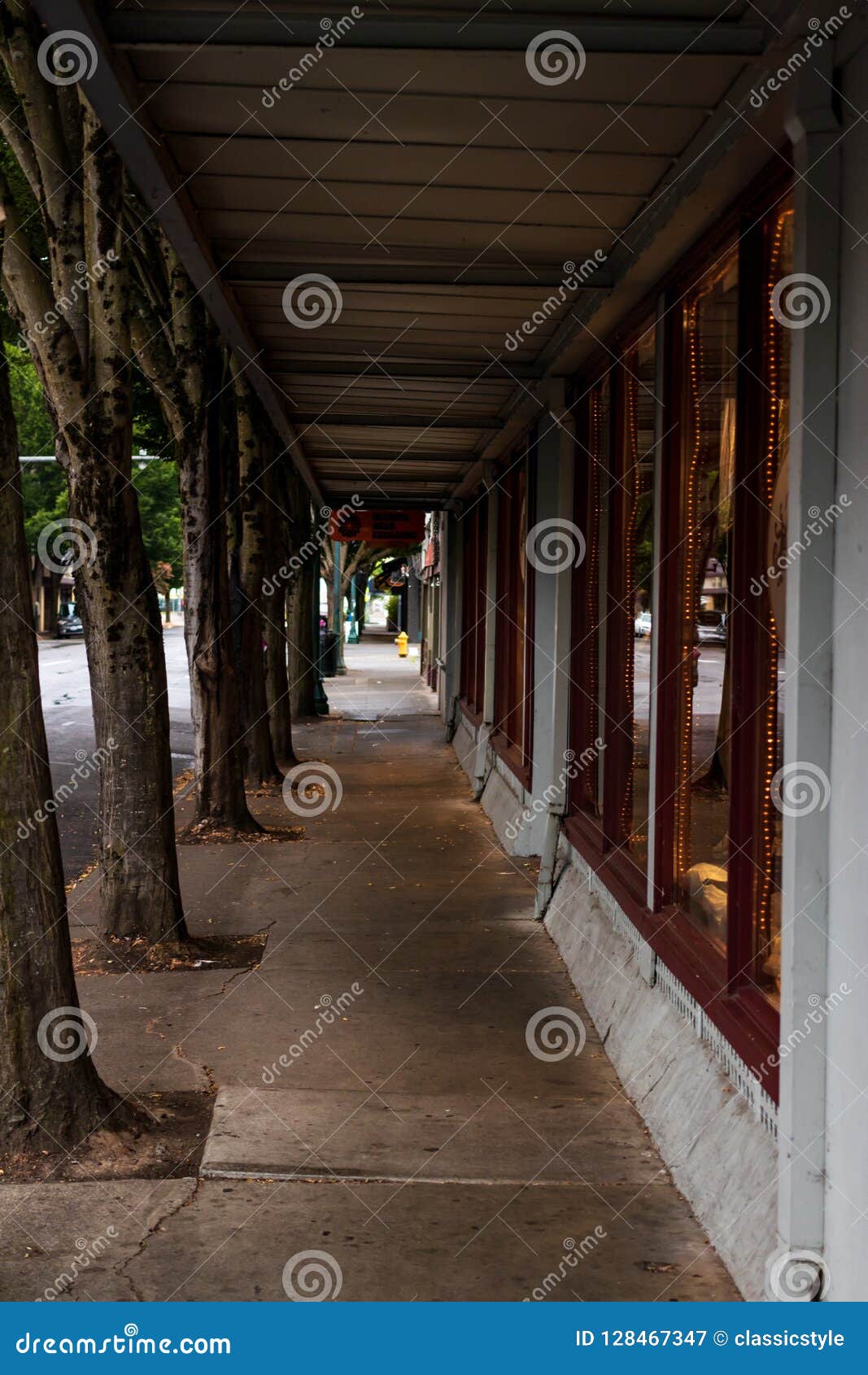 Empty Retail Storefront Covered Sidewalk Stock Image - Image of ...