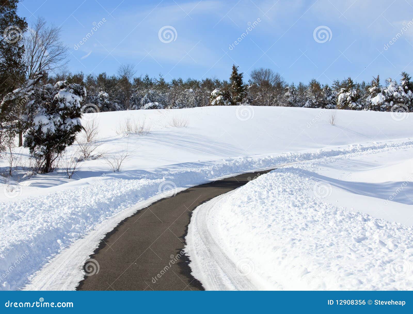 Empty road cleared of snow stock photo. Image of outdoor - 12908356