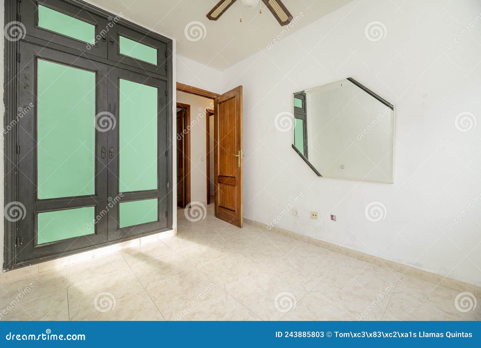 Empty Room with Light Stoneware Floor, Mirror on the Wall and Closet ...