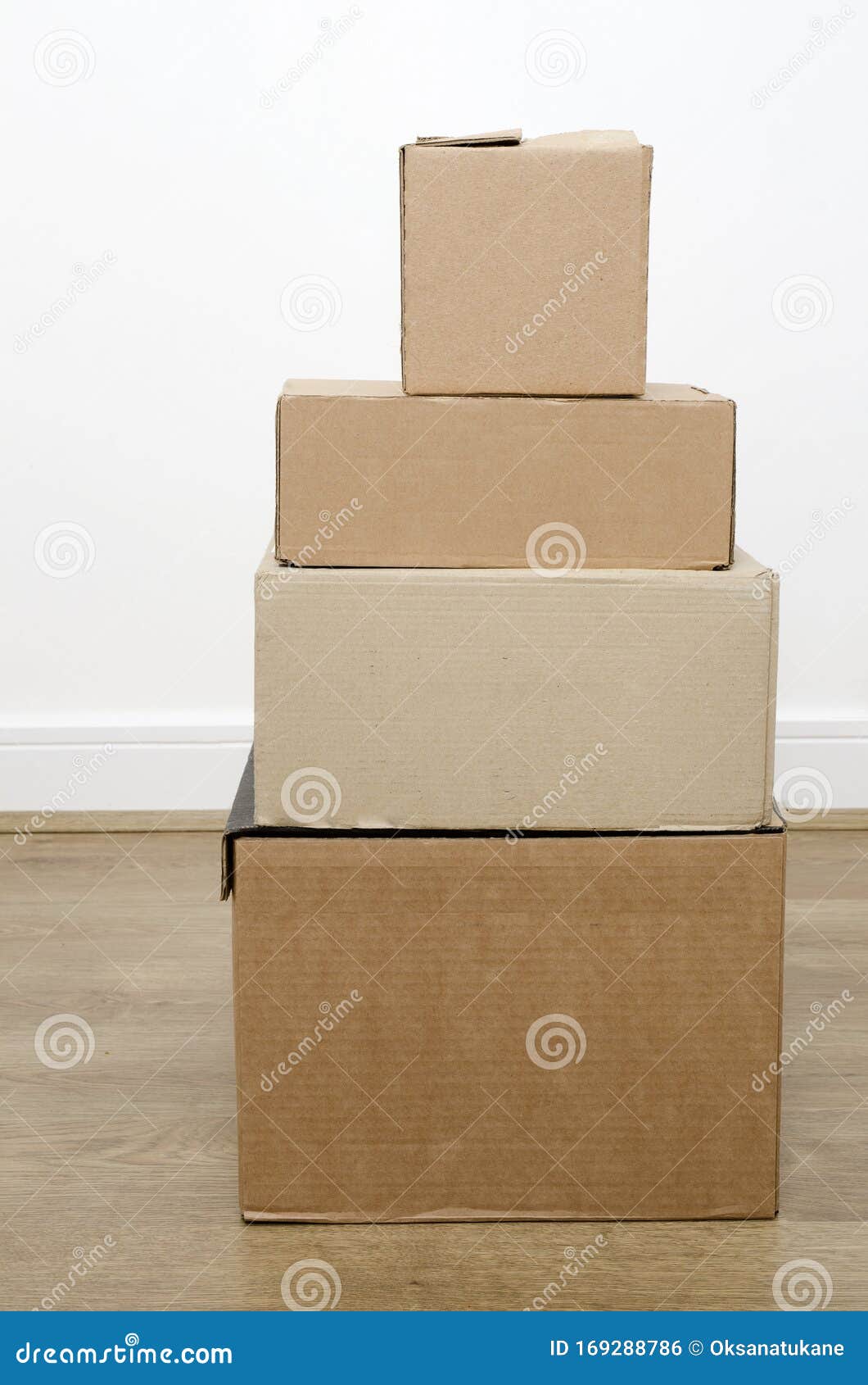 Empty Room with Stack of Cartons: Moving House Concept. Moving in ...